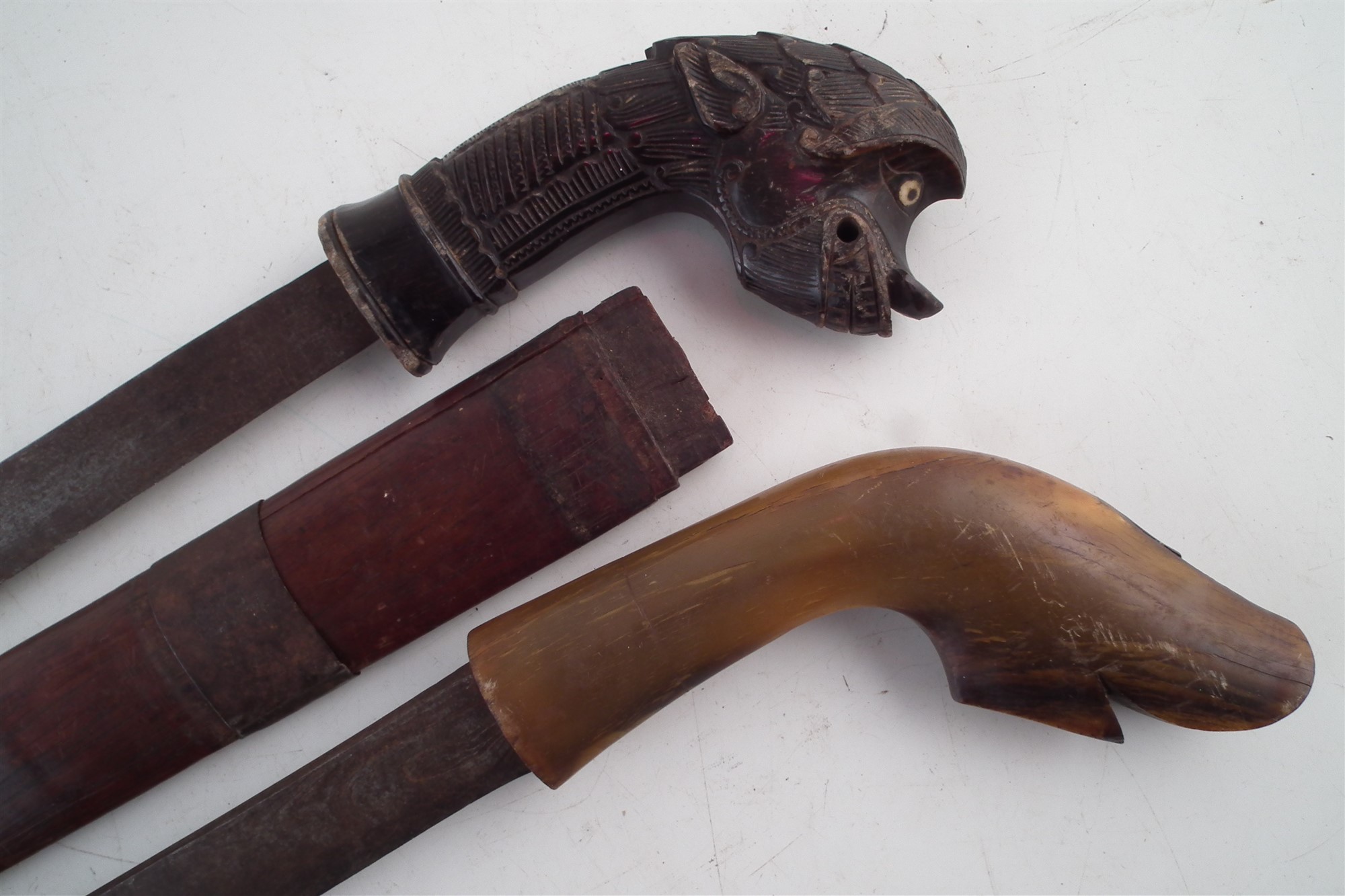 Lot 214 - Two Malay /Indonisian Klewang swords,