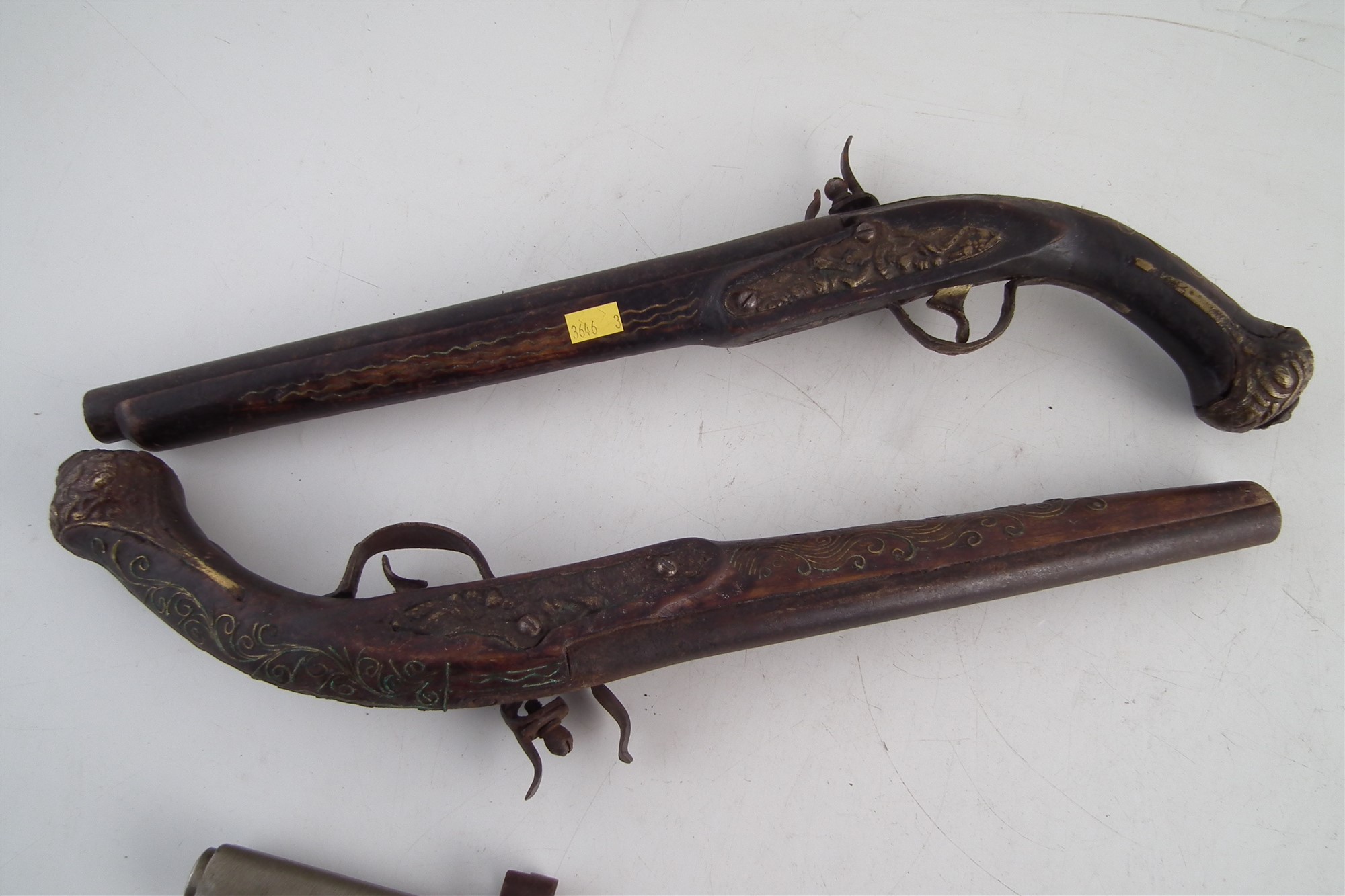 Lot 4 - Pair of decorative flintlock pistols and a