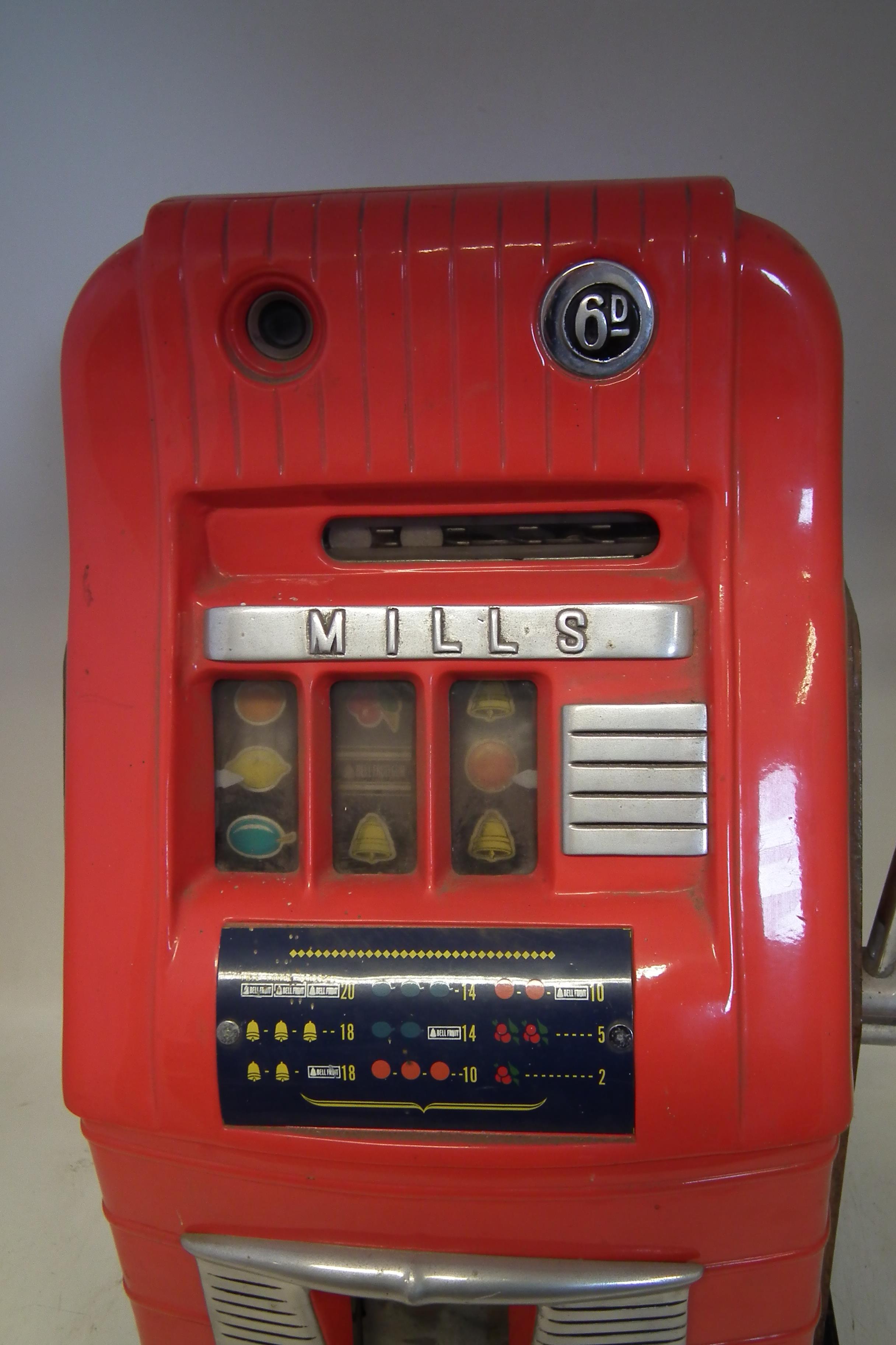 Lot 97 - Mills One Arm Bandit three drum fruit machine,