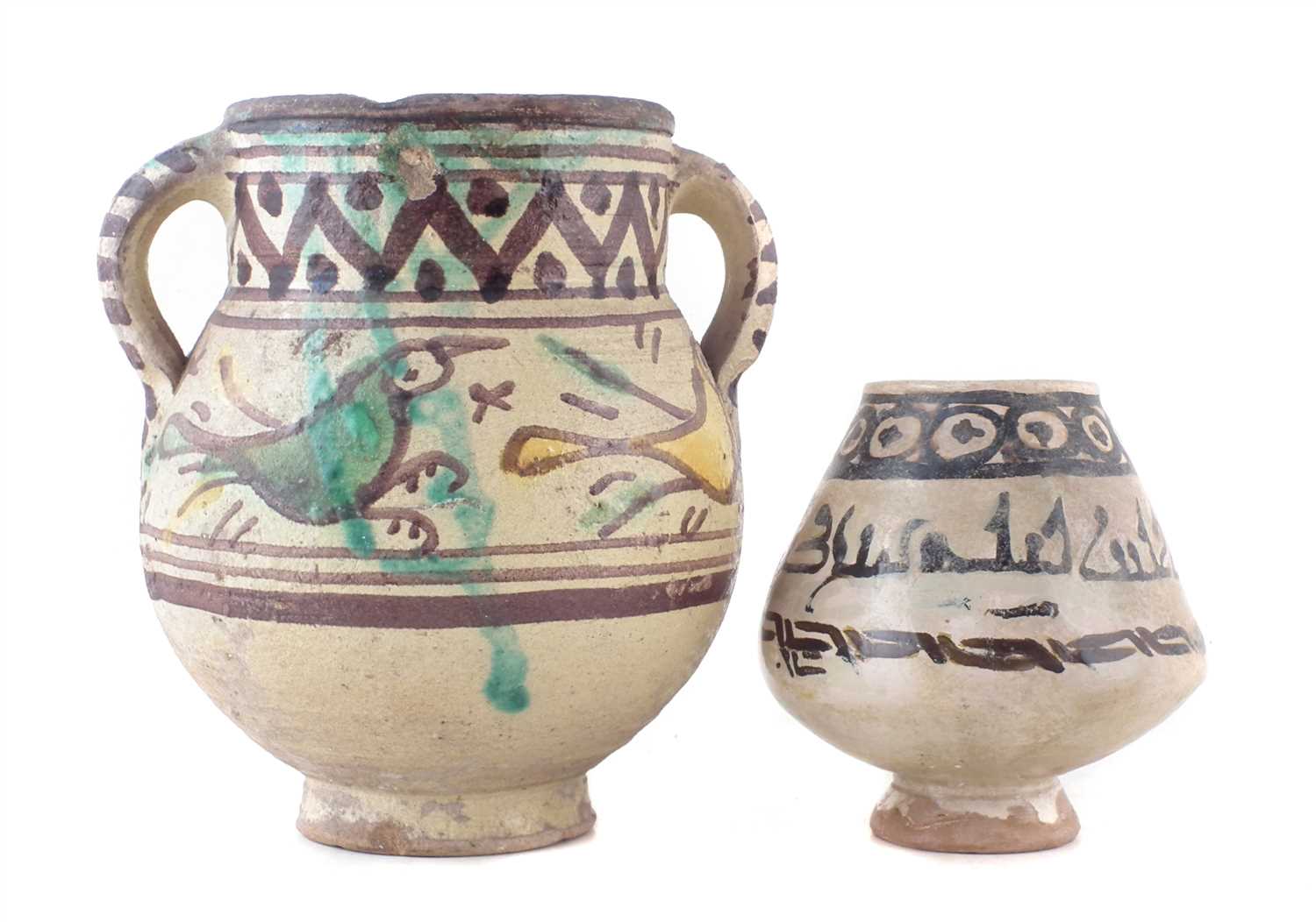 Lot 227 - Two Iranian pottery vases.