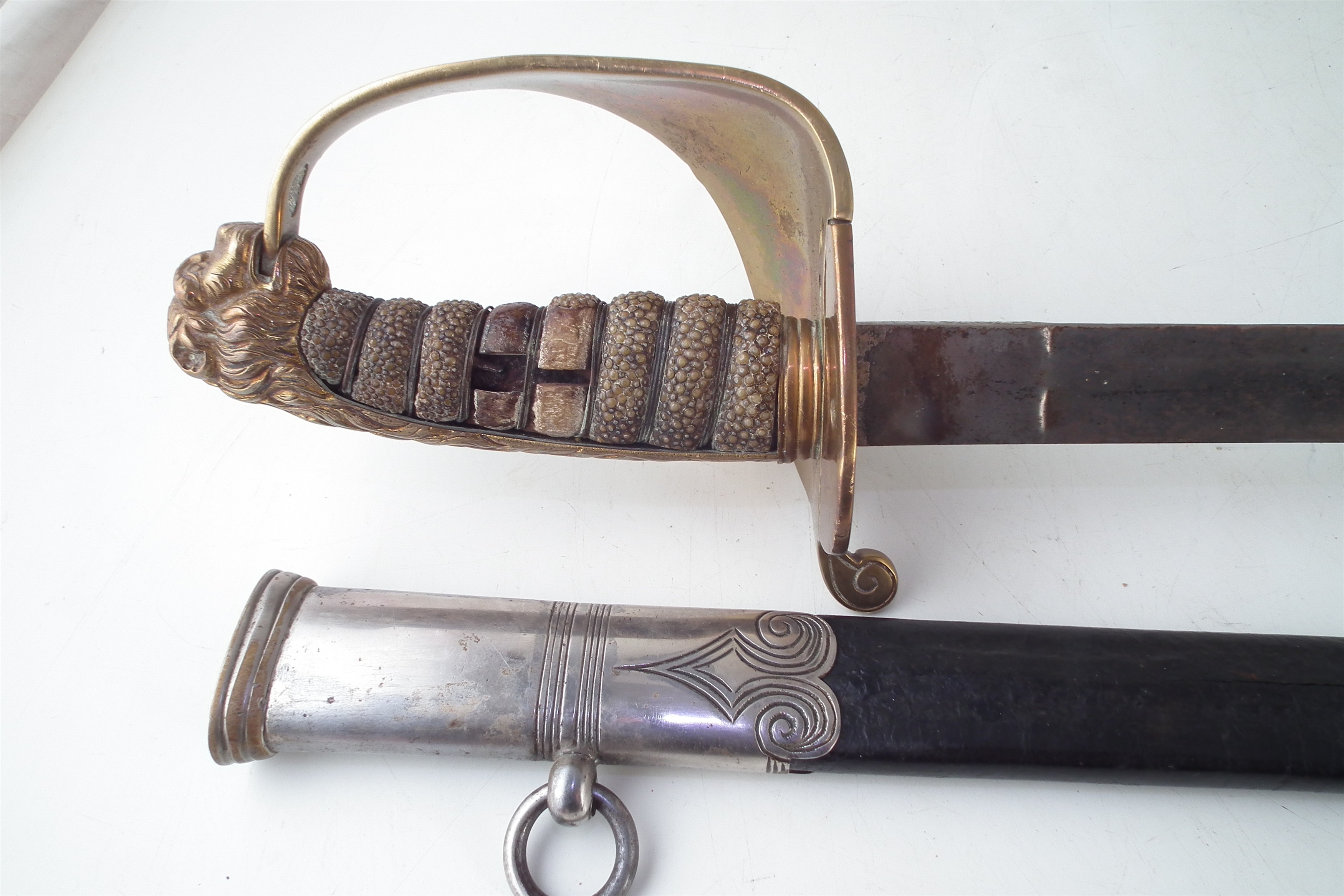 Lot 142 - Royal Navy Officers sword,