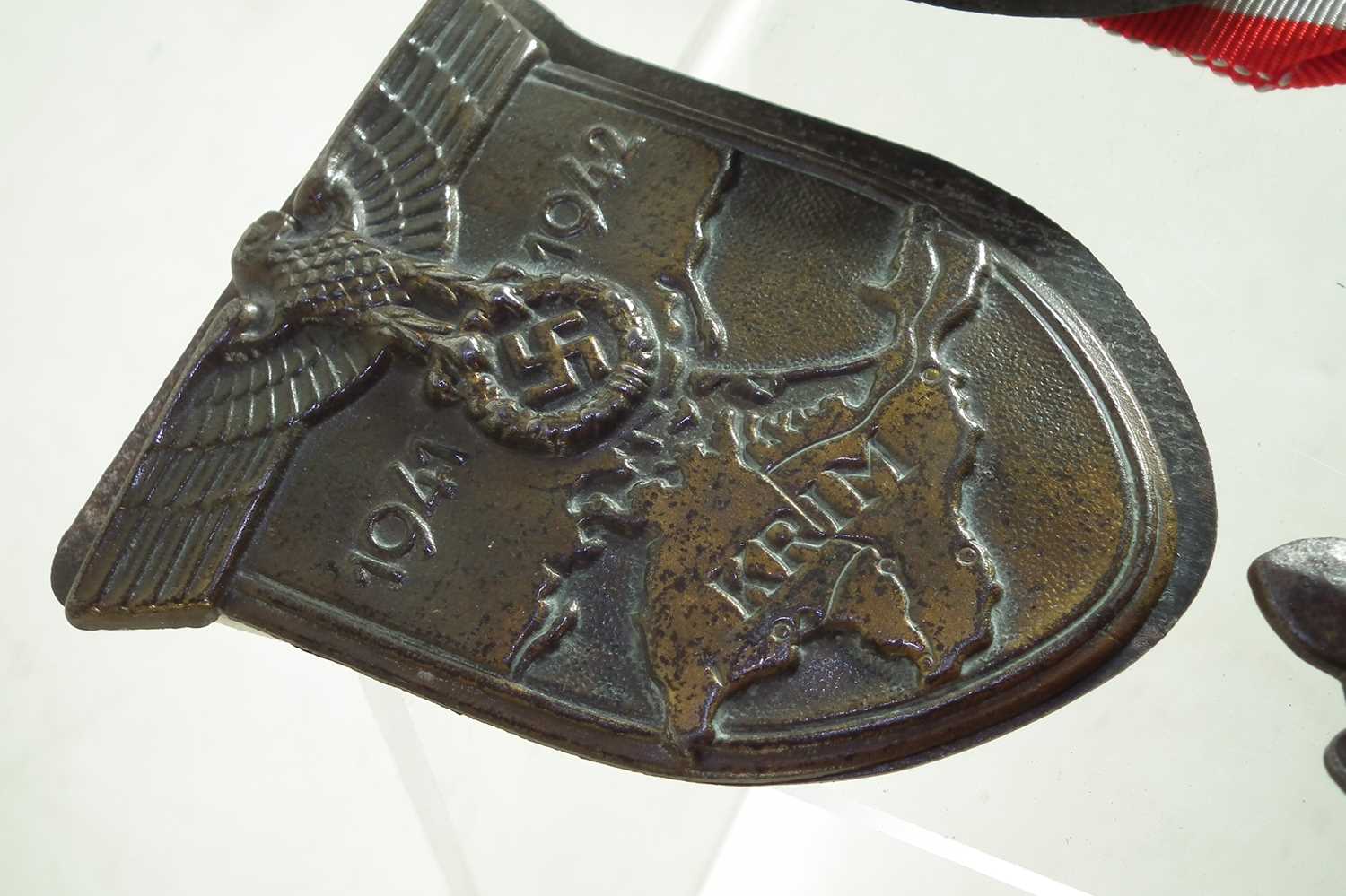 Lot 278 - Three German Third Reich badges and a medal