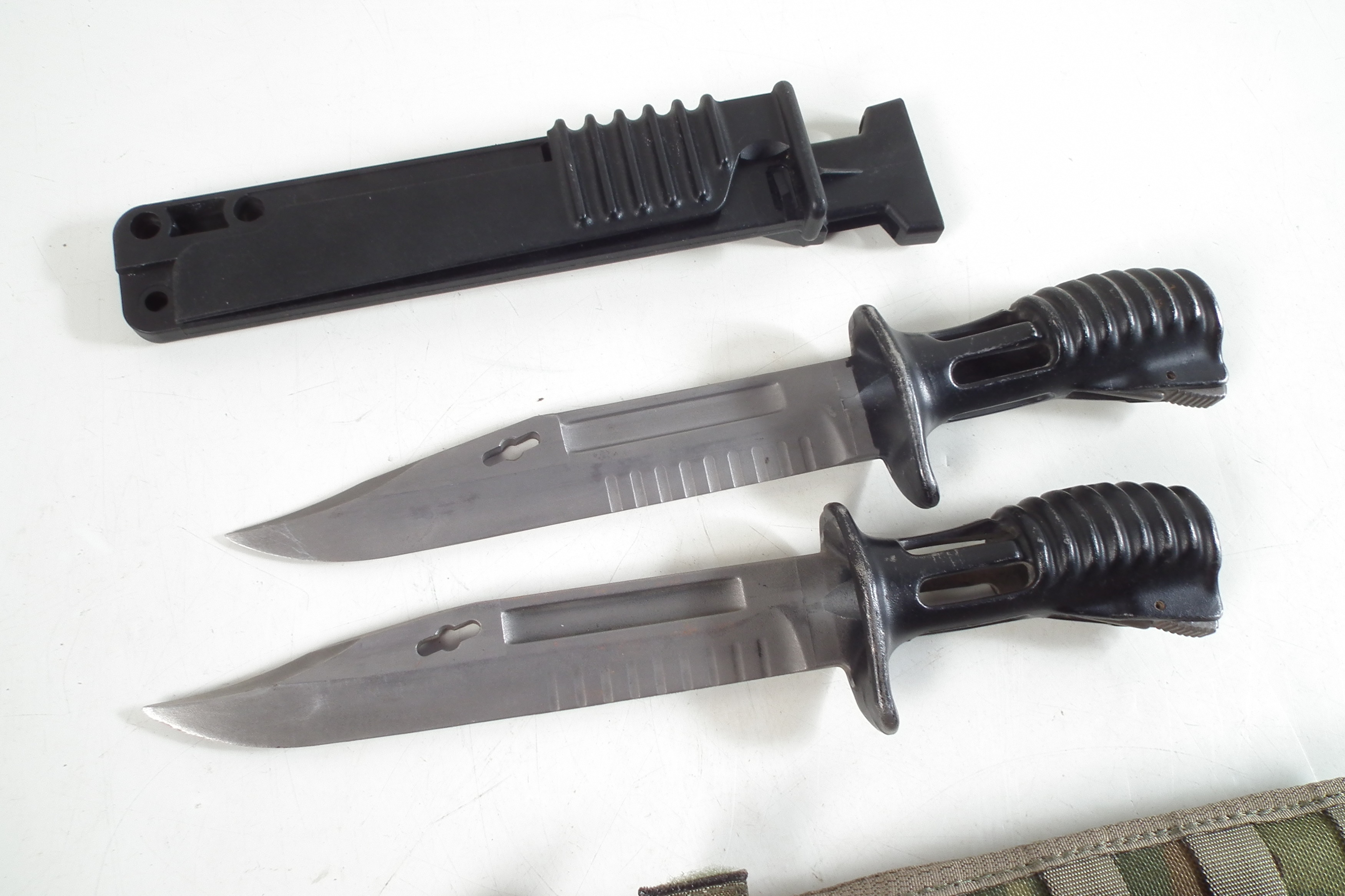 Lot 425 - Two SA80 bayonets, a carved wood copy and a