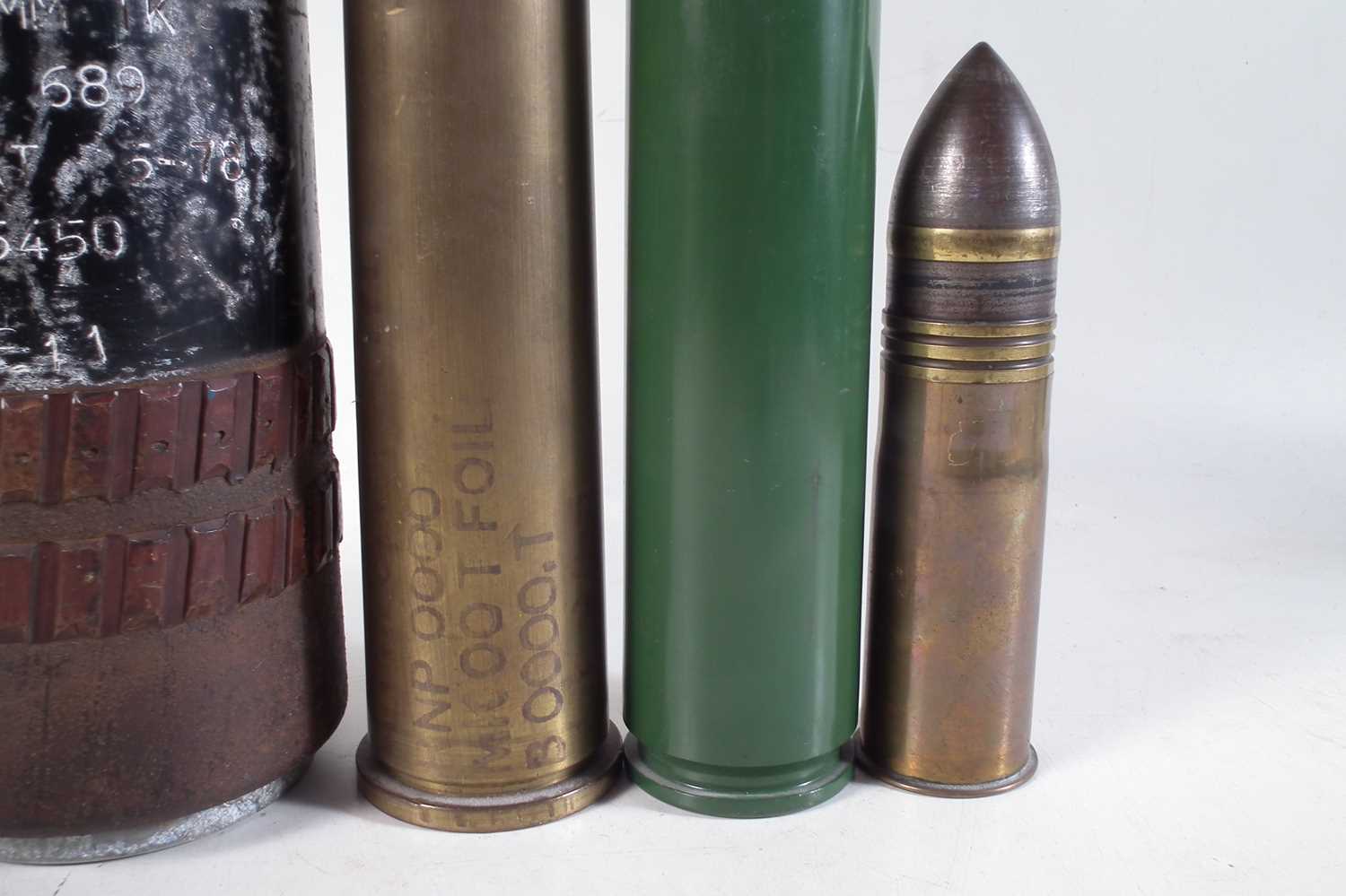 Lot 389 - Two inert shell heads and three artillery