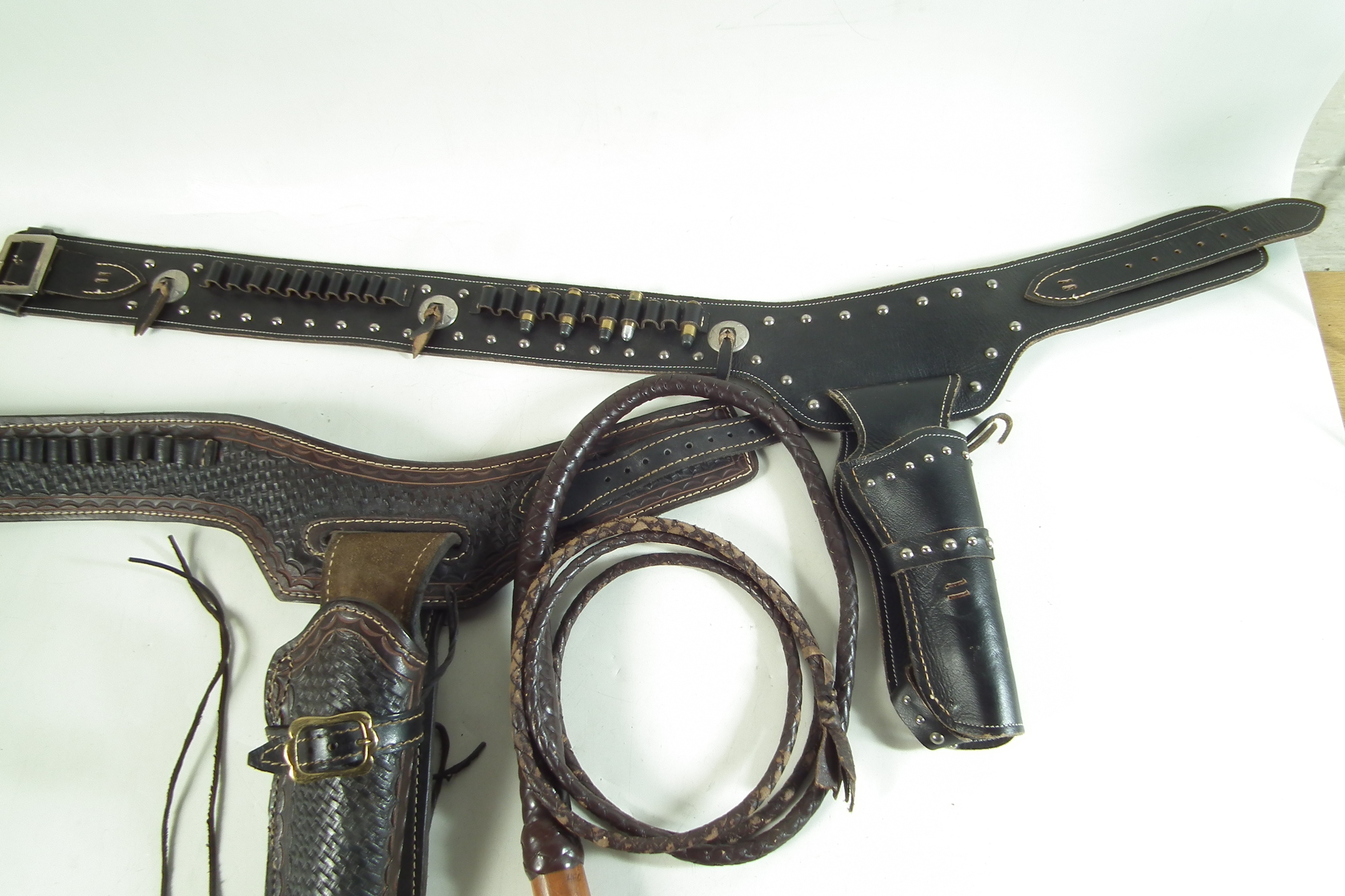Lot 457 - Two leather Western style revolver rigs
