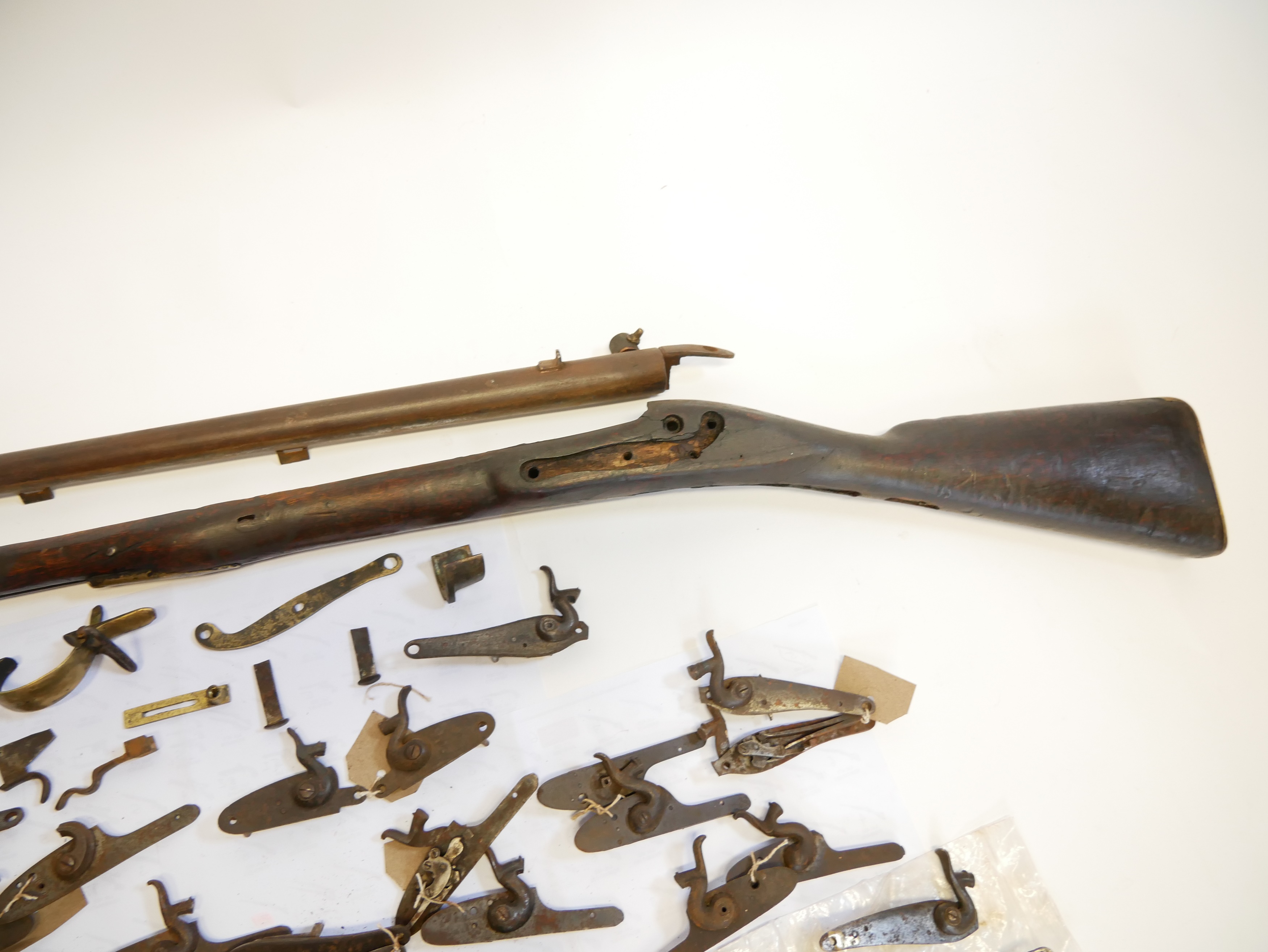 Lot 233 - Major parts of a musket and a collection of