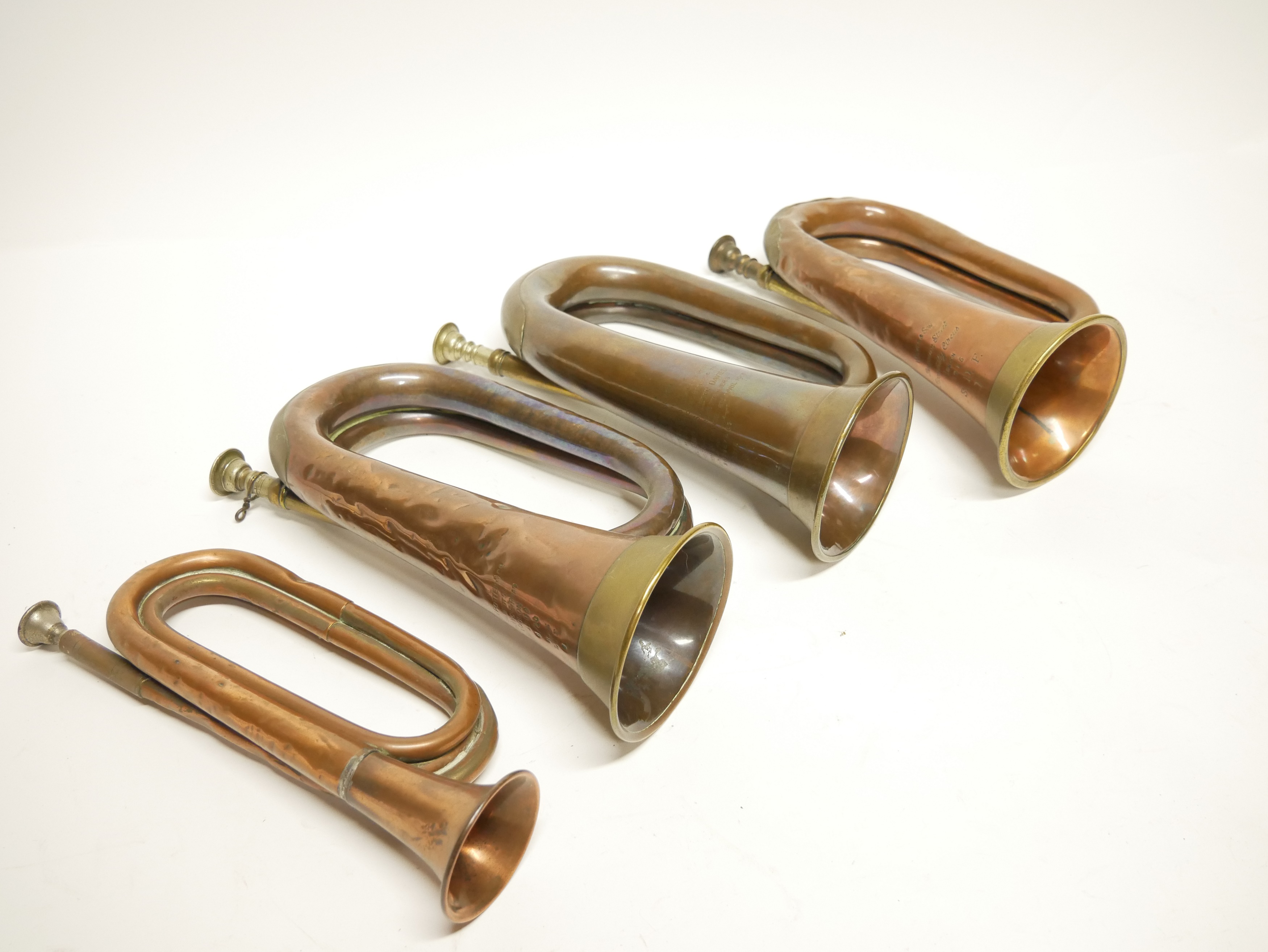 Lot 389 - Four bugles, one with Lancashire Fusiliers