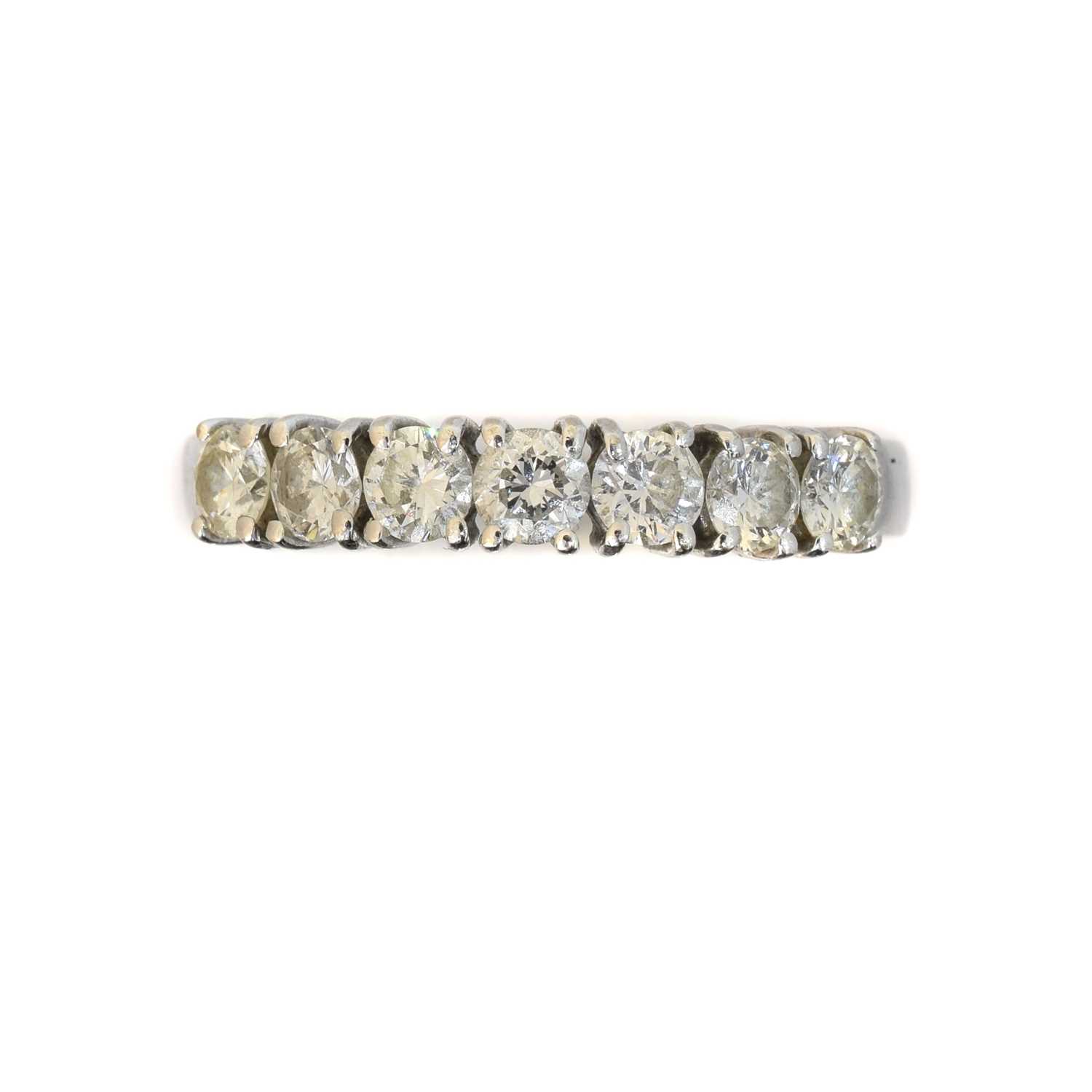 Lot 125 - An 18ct gold diamond seven stone ring,
