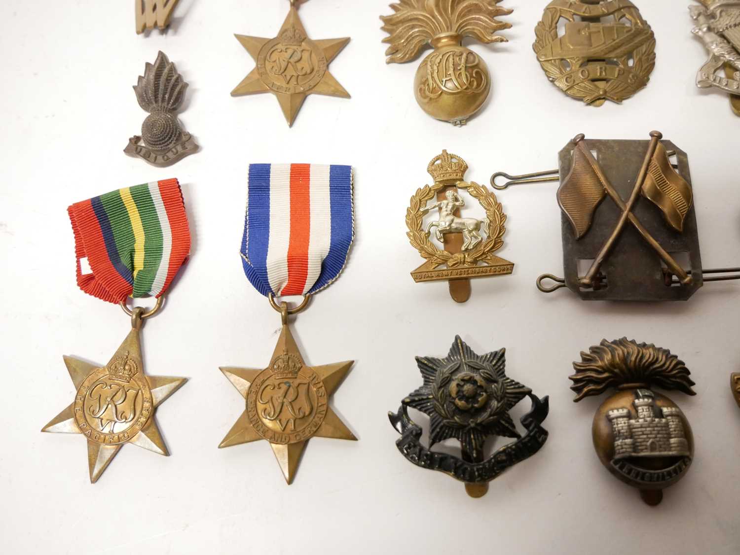 Lot 488 - Collection of cap badges, WWII medals and