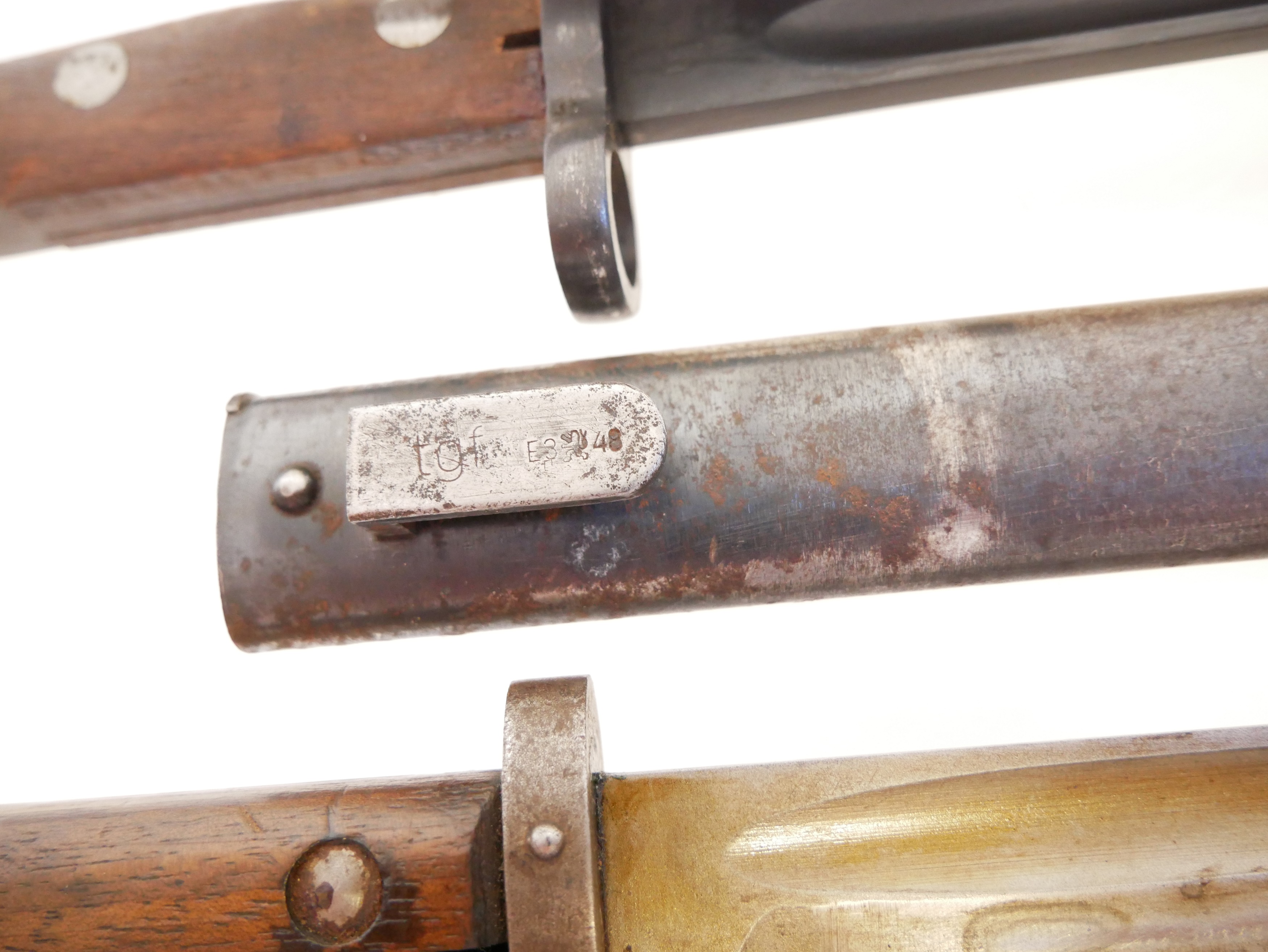 Lot 265 - Three Mauser rifle bayonets and scabbards.