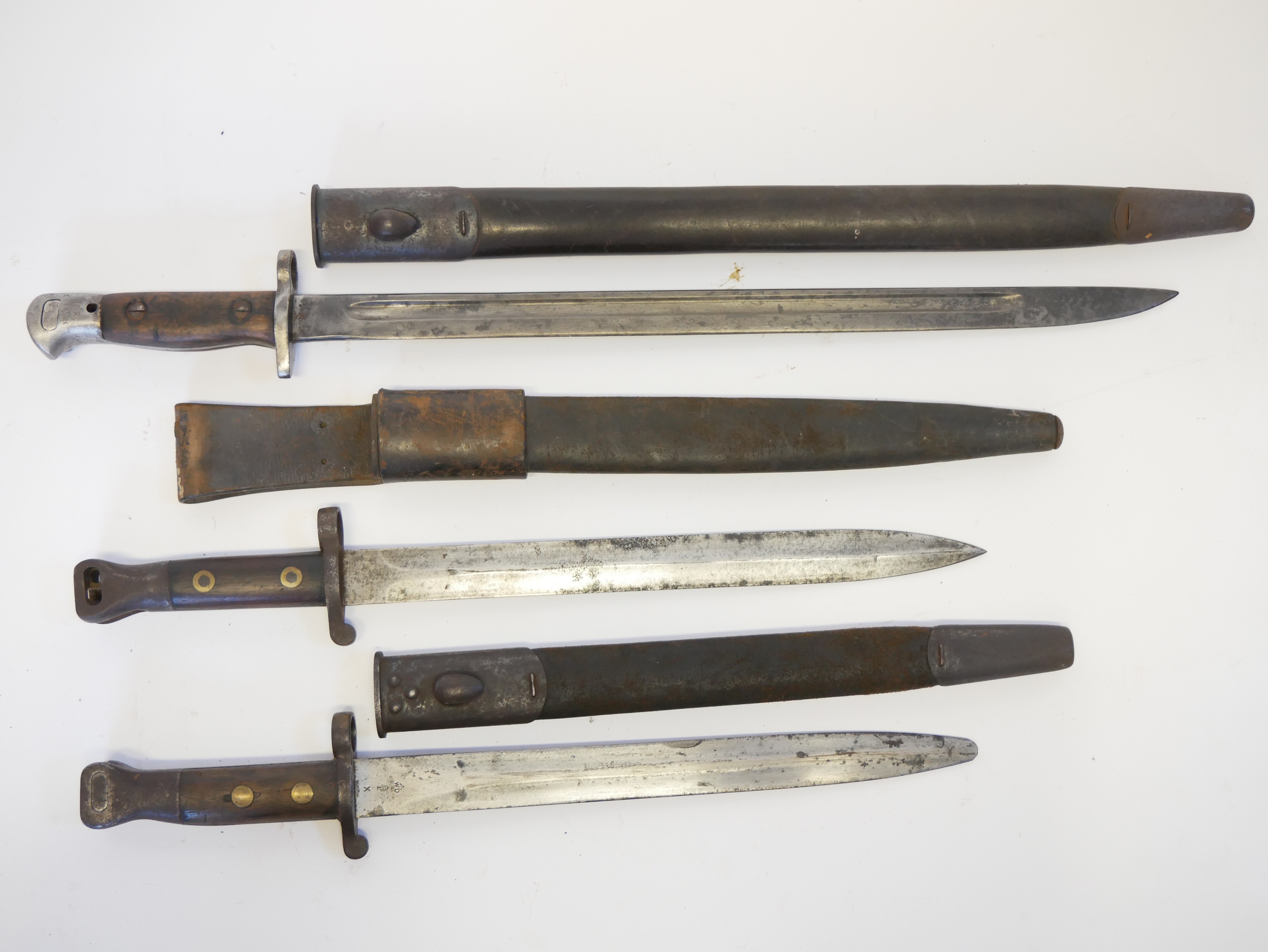 Lot 236 - Three British Lee Enfield rifle bayonets and