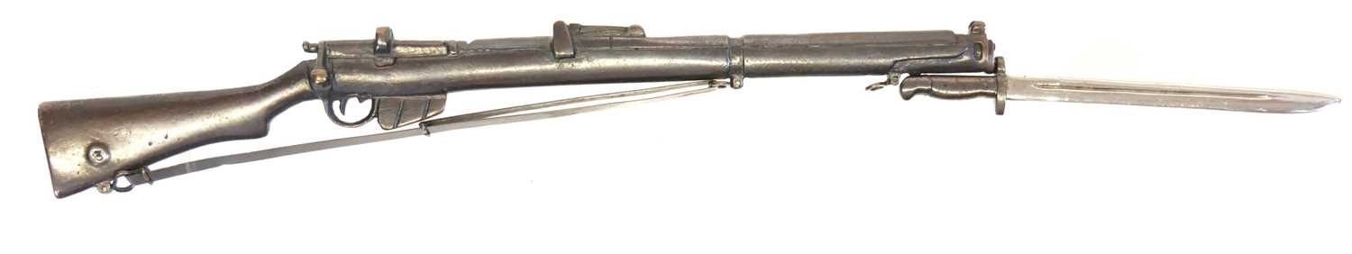 Lot 348 - Miniature bronze Lee Enfield SMLE rifle