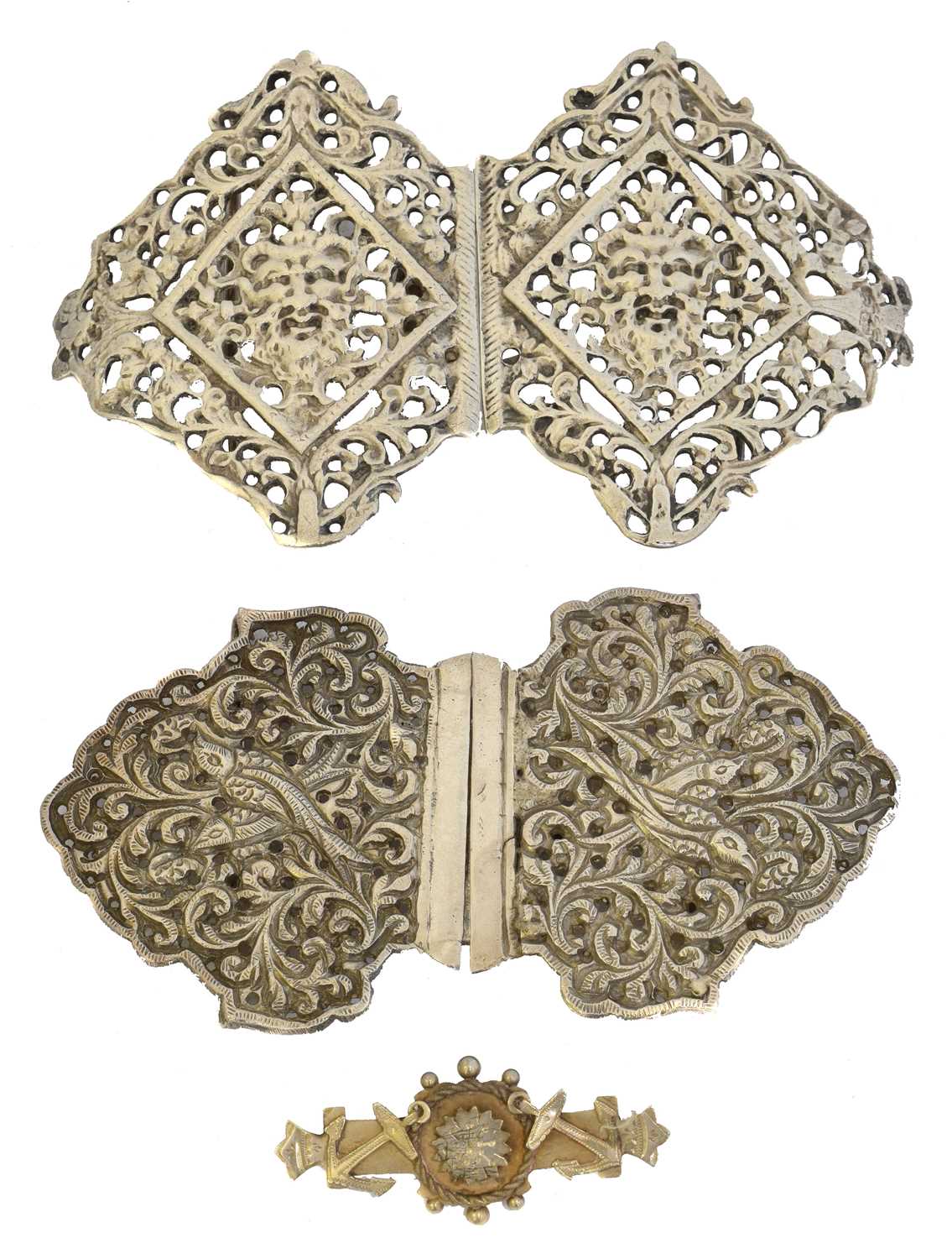 Lot 116 - Two silver nurse buckles,