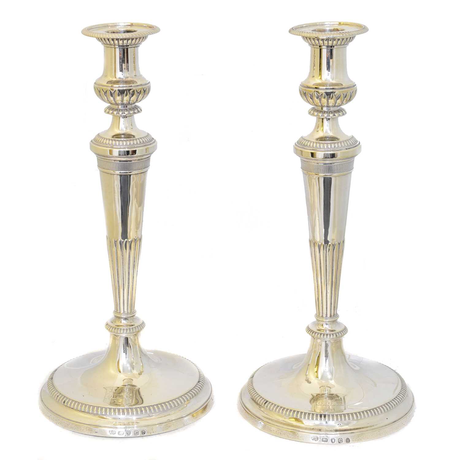 Lot 52 - A pair of George III silver candlesticks,