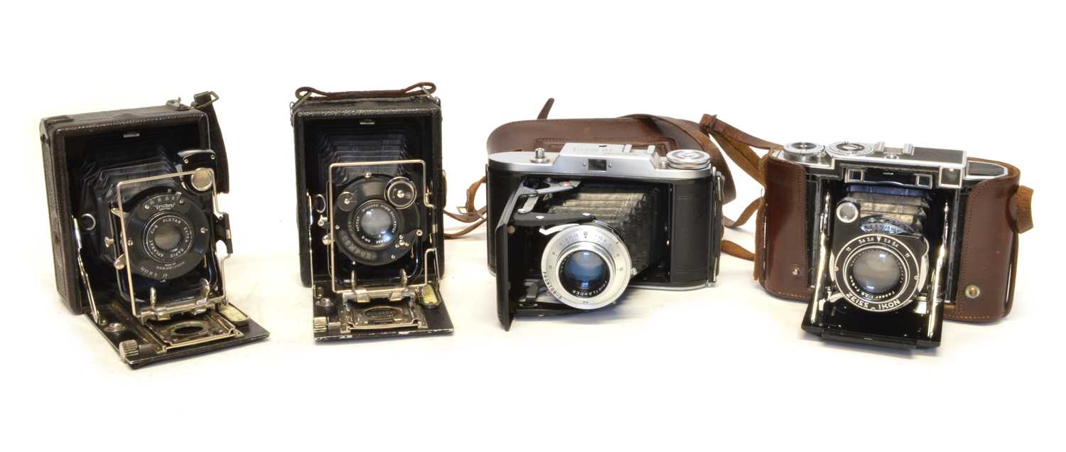 Lot 216 - Four folding cameras