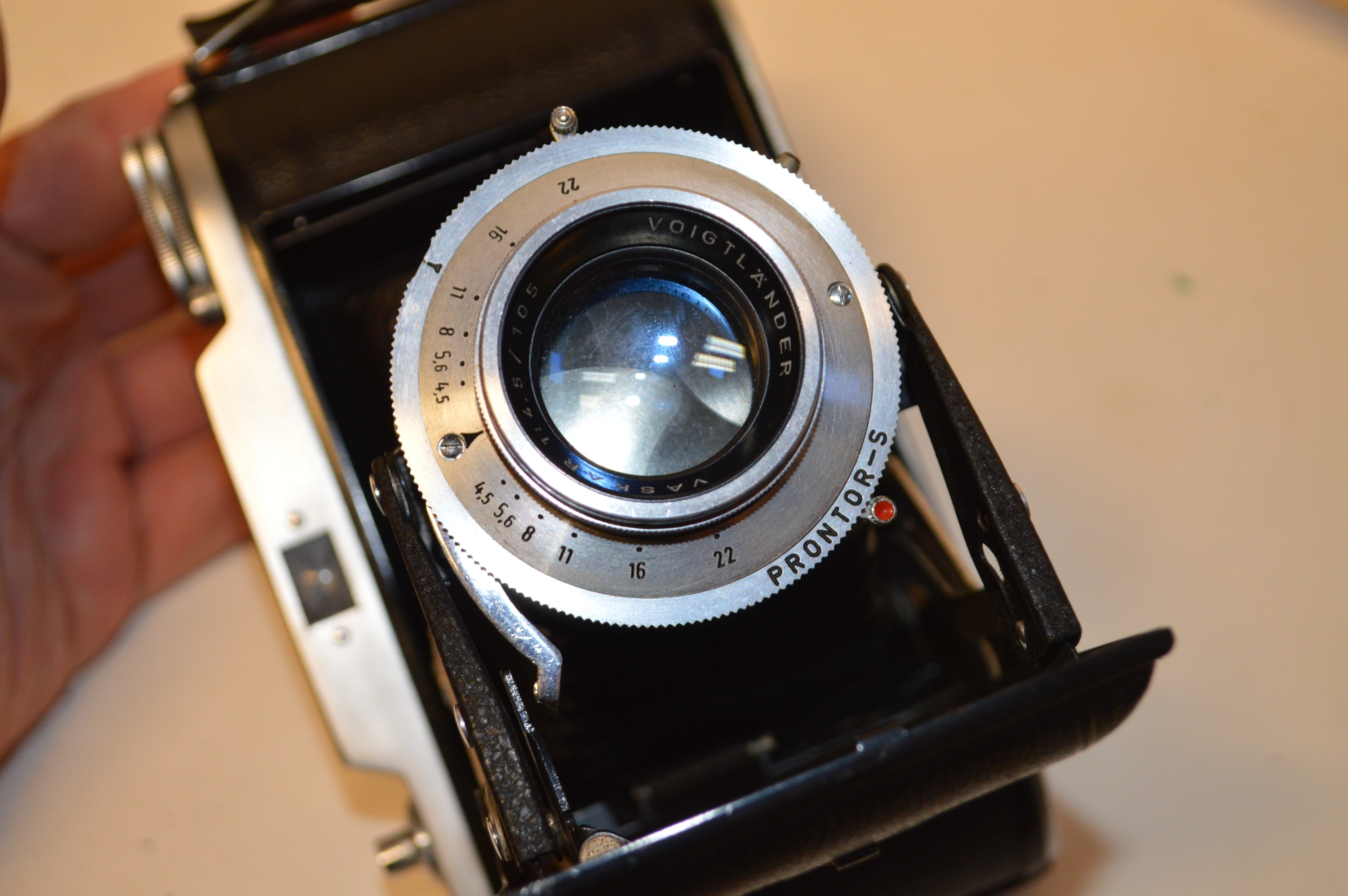 Lot 216 - Four folding cameras