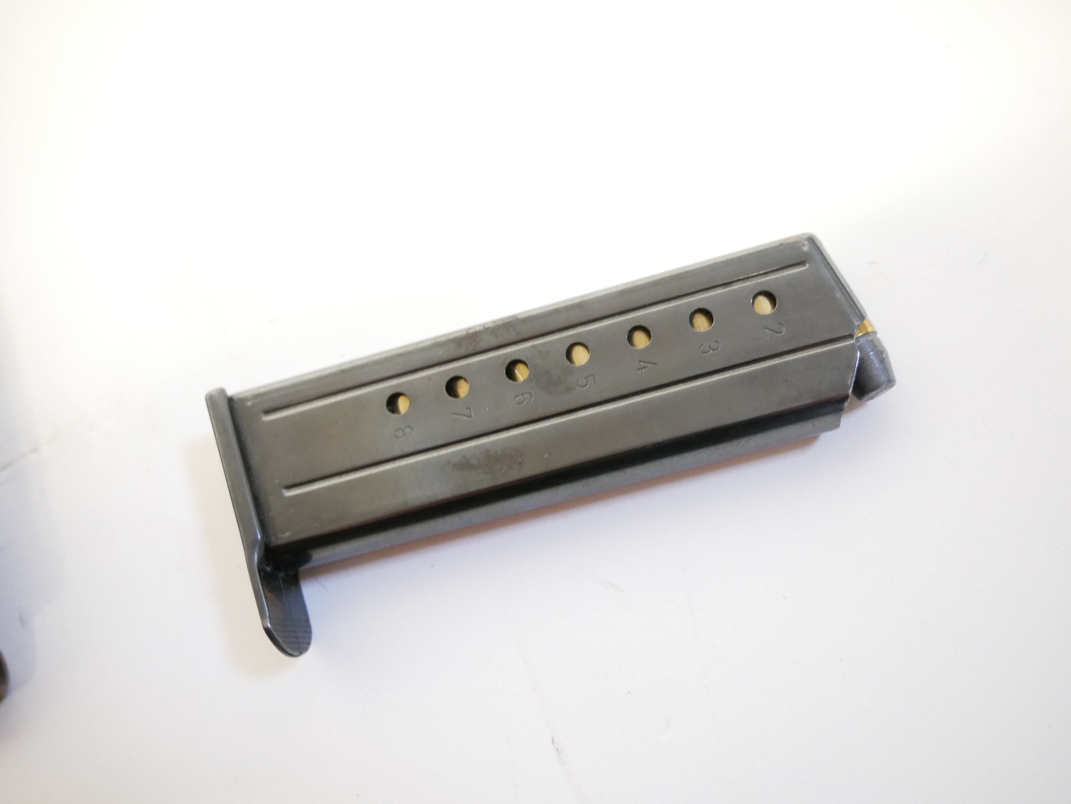 Lot 360 - H&K P7 M8 pistol magazine with inert