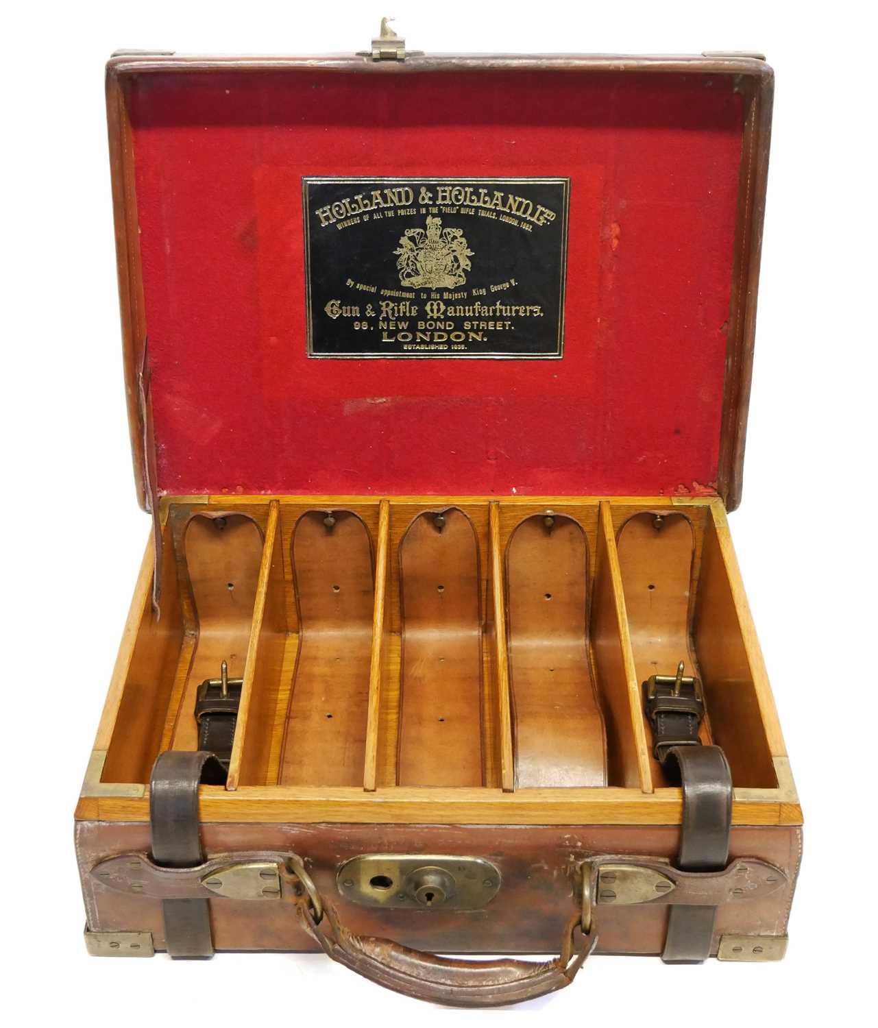 Lot 324 - Leather and oak cartridge magazine, with