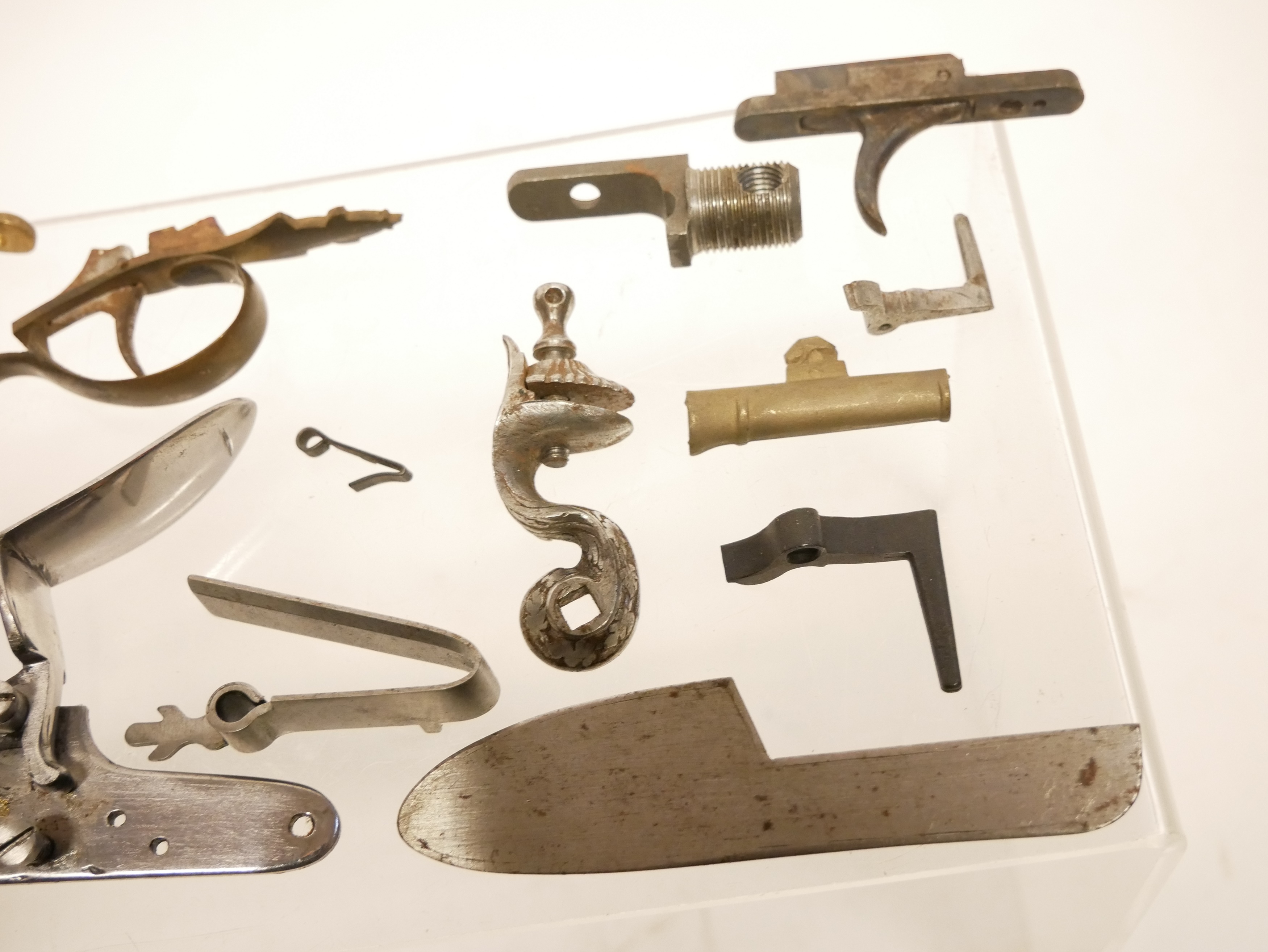 Lot 342 - Collection of muzzle loader gun lock parts