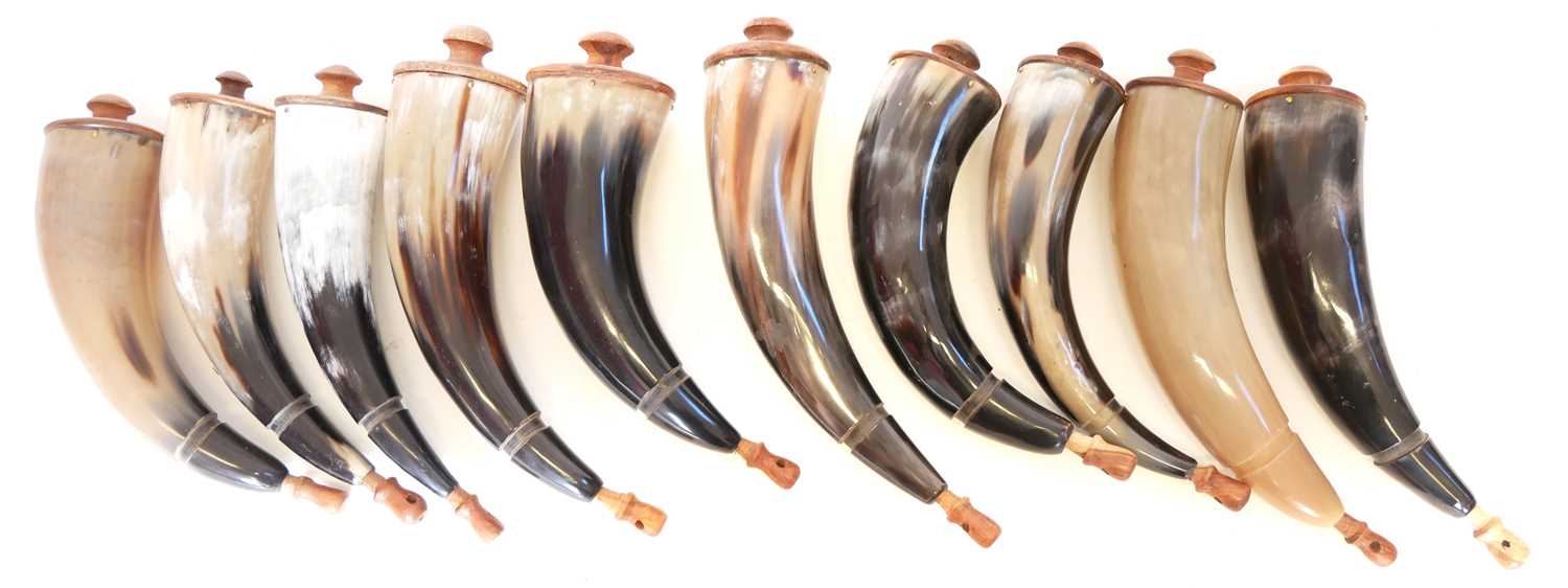 Lot 452 - Ten modern powder horns with turned wood