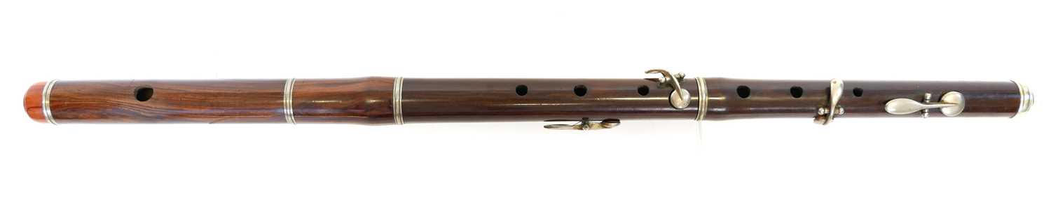 Lot 238 - Four key rosewood flute