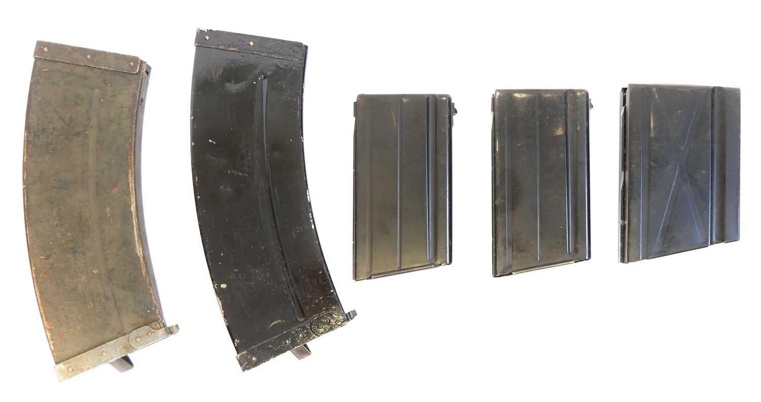 Lot 460 - Five various gun magazines to include two