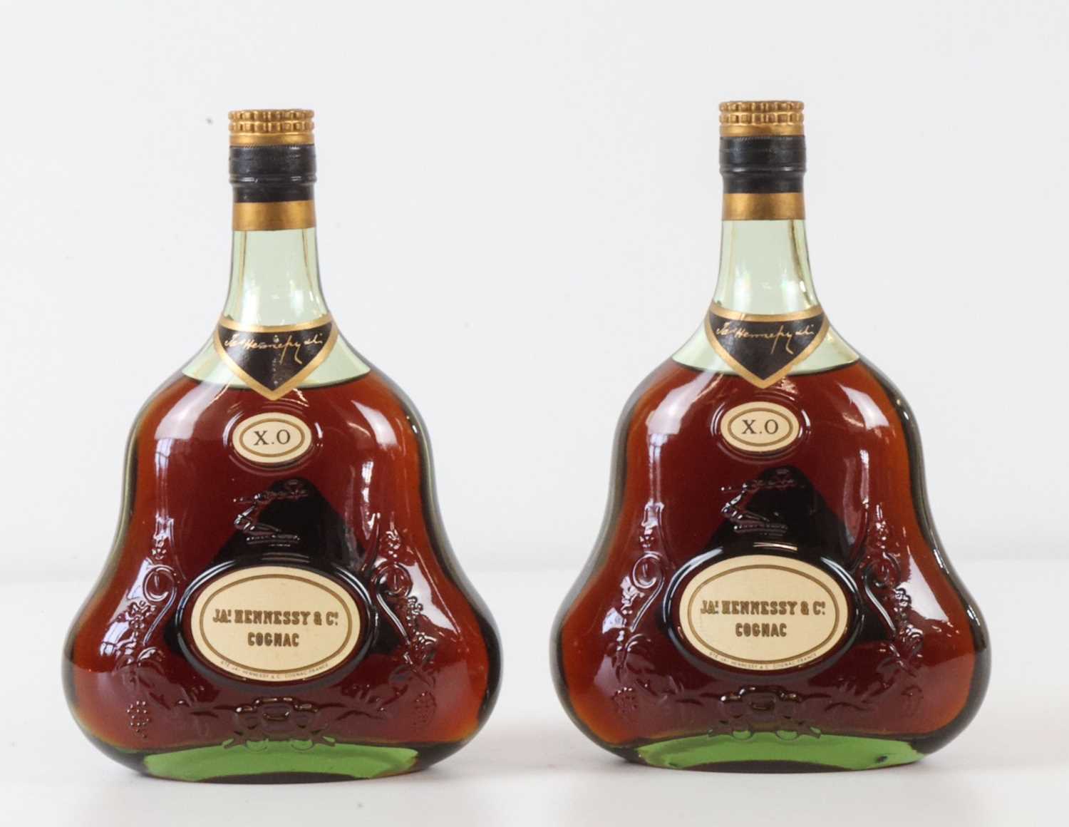 Lot 129 - 2 Bottles from 1970’s Hennessy XO Cognac 24