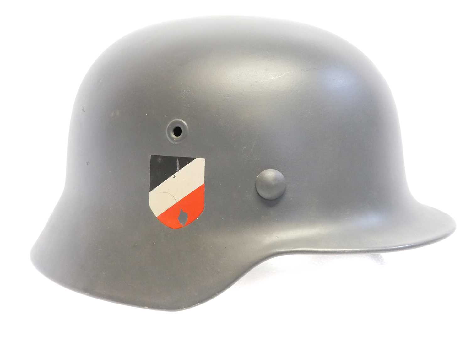 German M40 helmet, fully repainted and rebadged, the