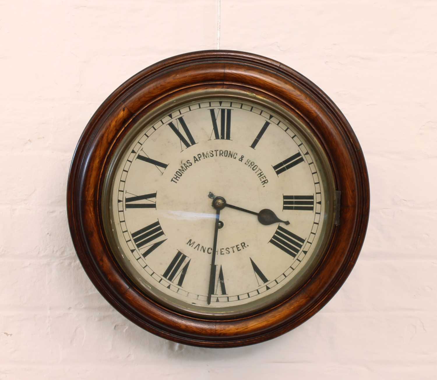Lot 69 - A Late Victorian Oak Cased 12" Wall Clock by