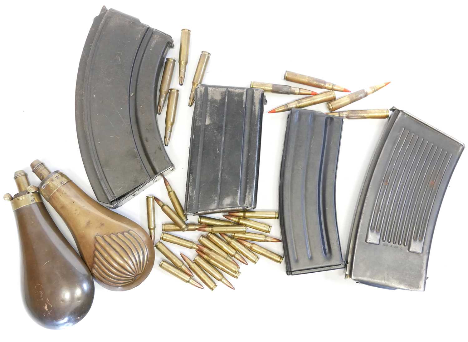 Lot 469 - Four magazines with inert ammunition, to