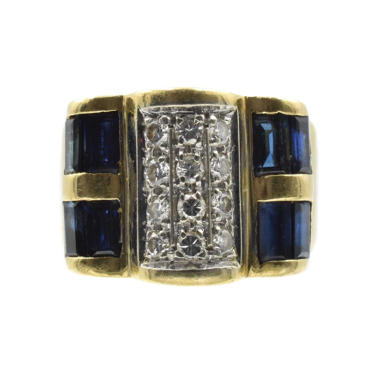 Lot 143 - A Hefty 18ct gold, sapphire and diamond ring