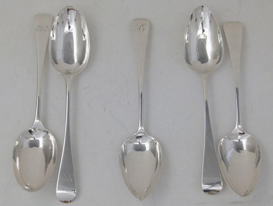 Lot 313 - Five silver serving spoons.