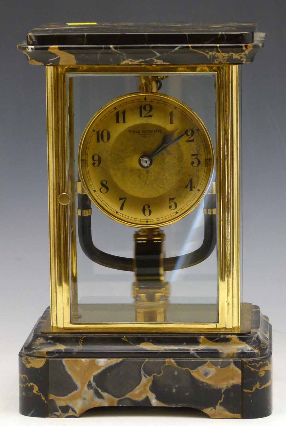 Lot 615 - Bulle clockette four glass electric clock