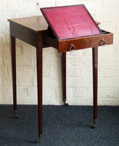 Lot 421 - Edwardian mahogany writing table