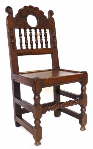 Lot 521 - 17th century oak back stool,