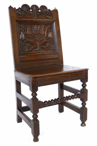 Lot 523 - 17th century oak back stool,