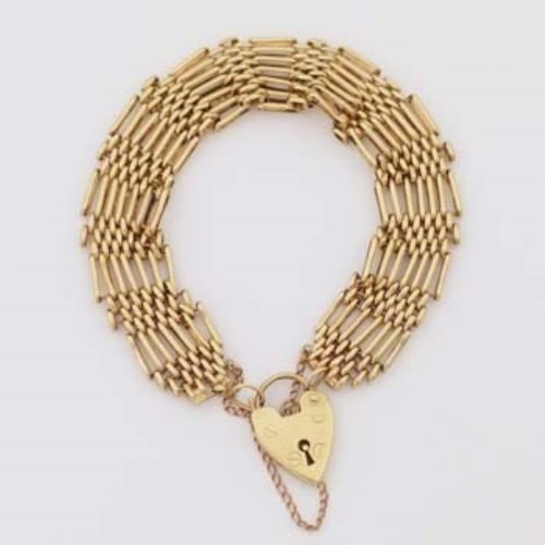 Lot 406 - 9ct gold gate bracelet with padlock clasp.