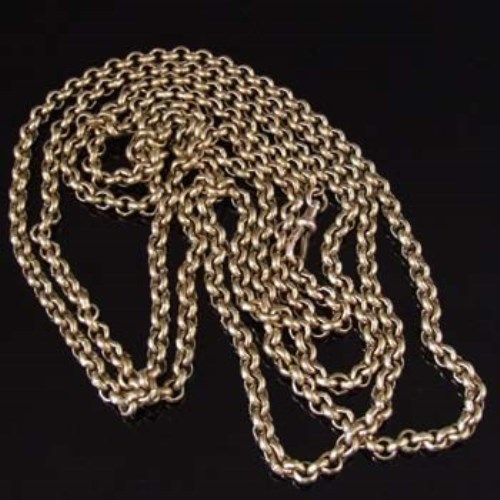 Lot 299 - 9ct gold muff chain.