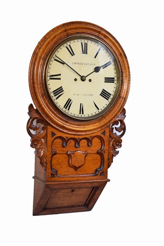 353 - A late 19th century oak drop dial wall clock by Swindon & Sons ...