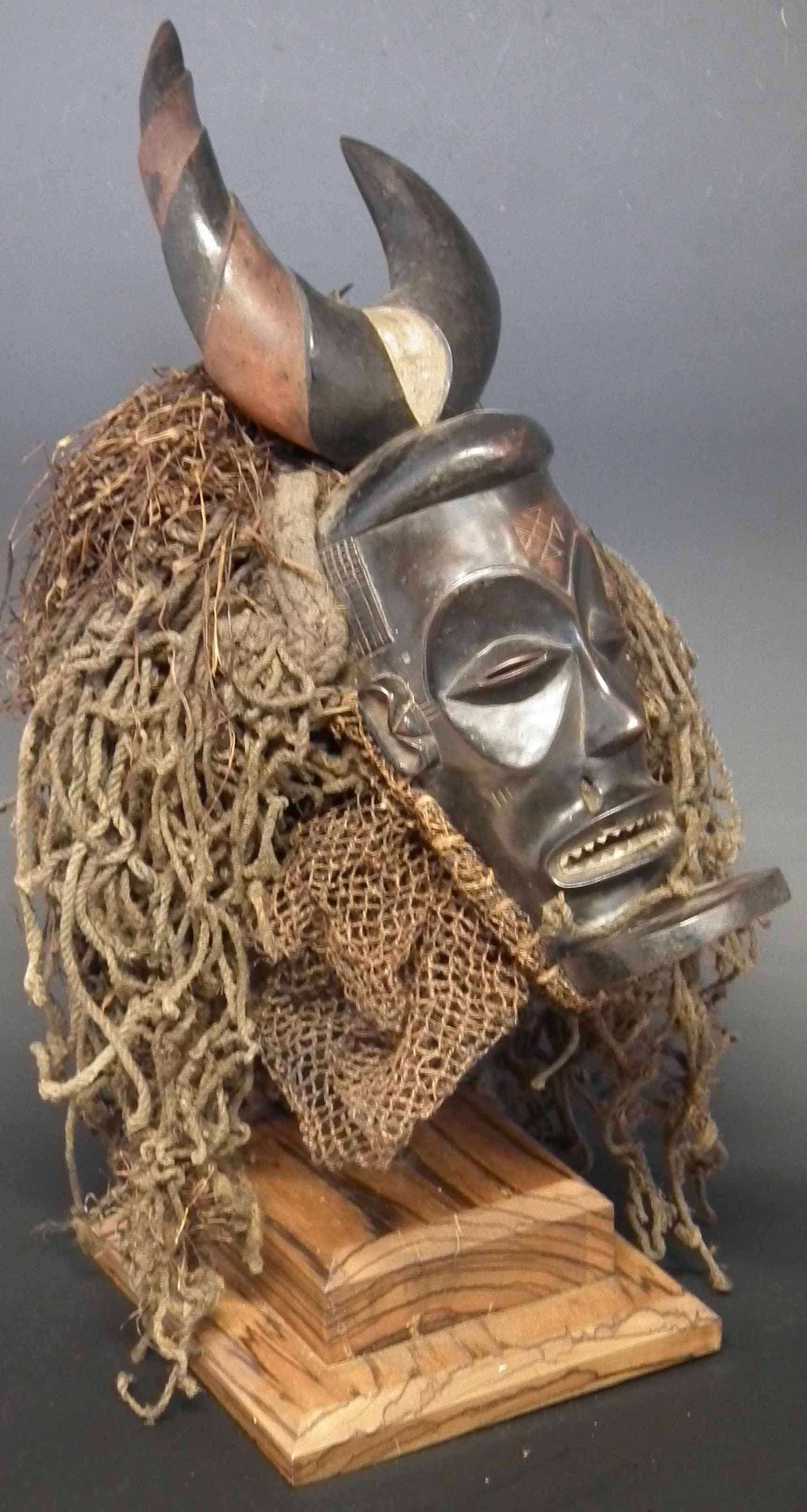 Lot 2 - Chokwe mask on stand, 56cm overall height