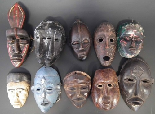 Lot 7 - Ten African masks carved in various tribal