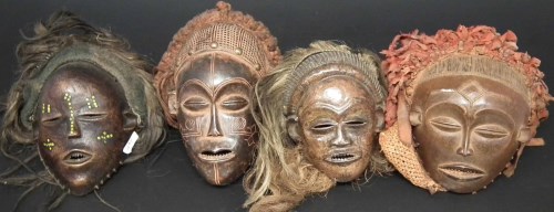 Lot 12 - Four Chokwe masks, the tallest measures 21cm
