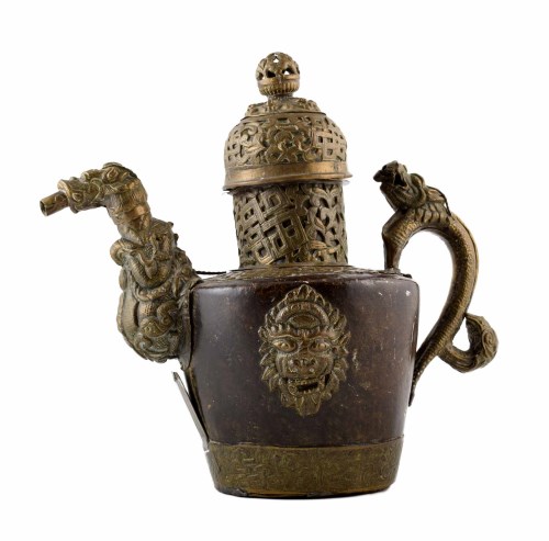 Lot 242 - A late 18th century Tibetan wine ewer